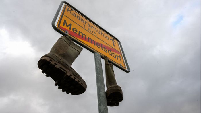 Fabelhafte Warum Hangen Gummistiefel An Ortsschildern Bild